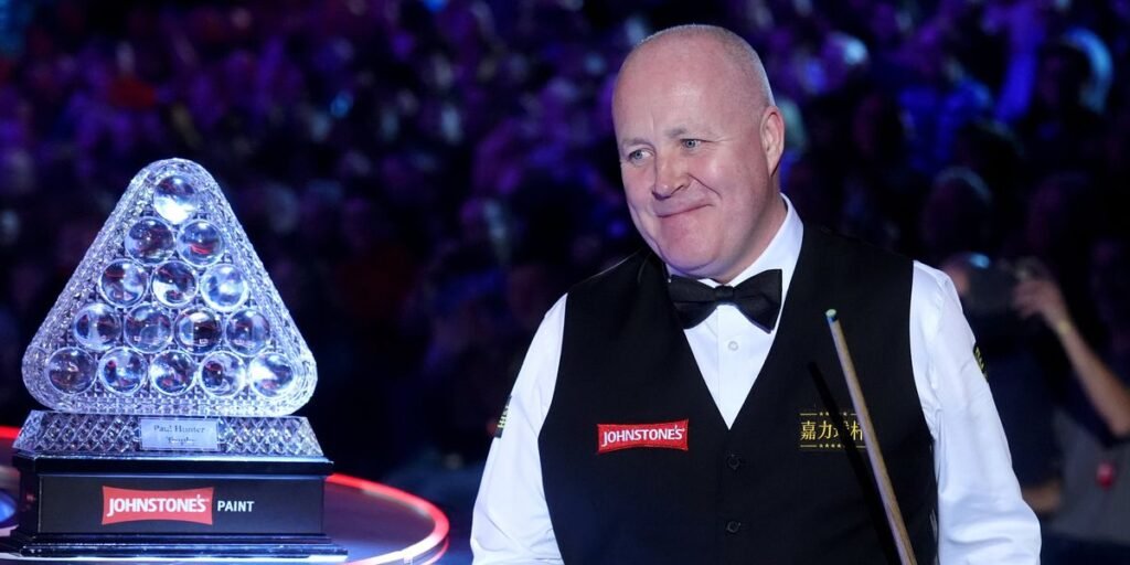 John Higgins stages remarkable comeback to defeat Judd Trump and reach ...