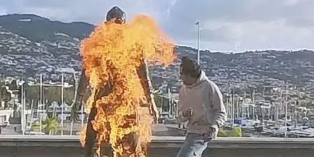 Police search for suspect who set fire to Cristiano Ronaldo statue in ...